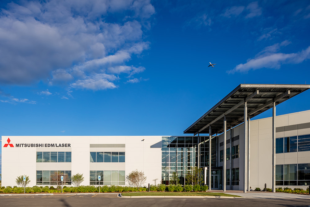 MC Machinery Office & Industrial Development - Opus